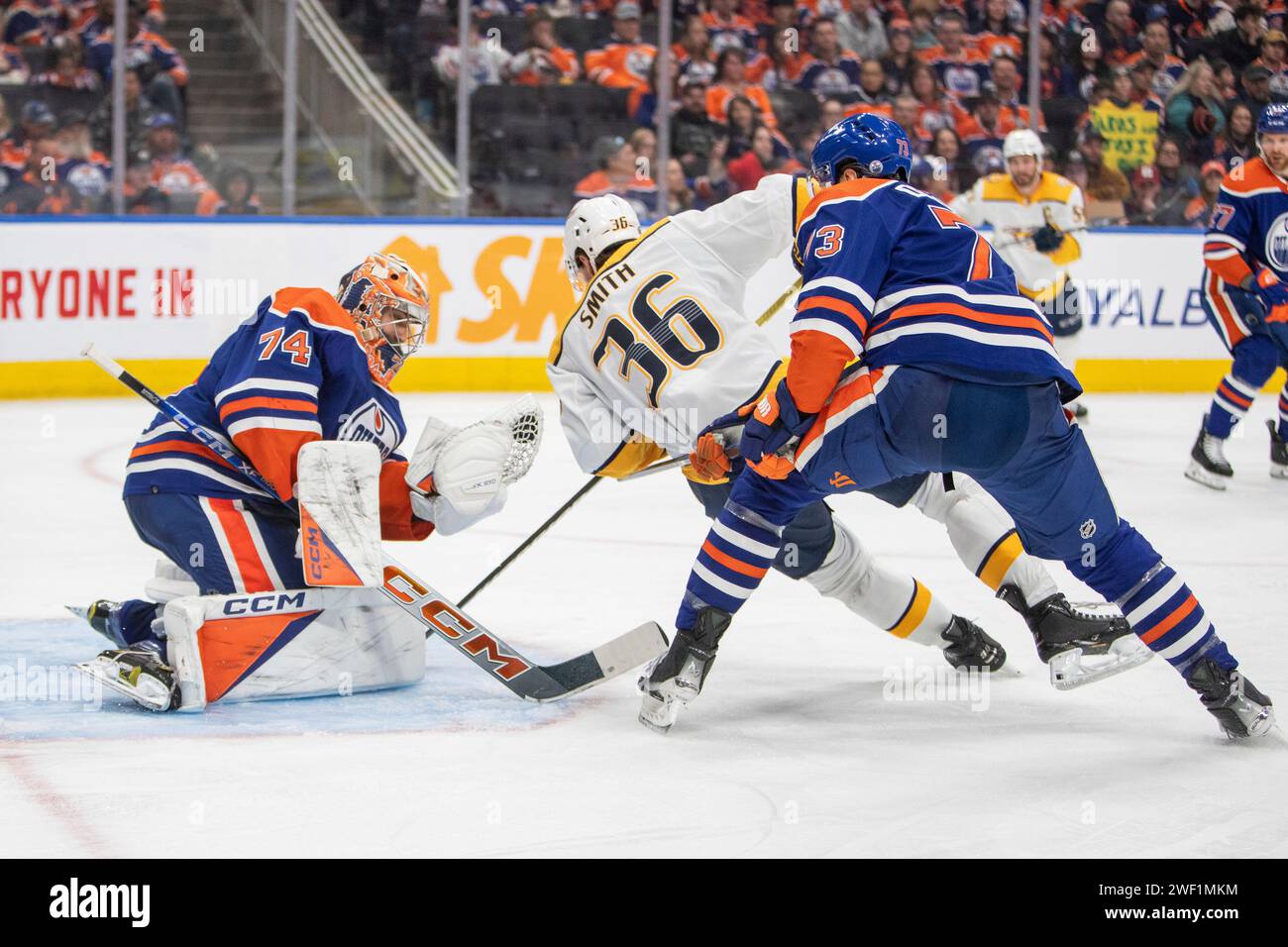 Nashville Predators' Cole Smith (36) is stopped by Edmonton Oilers ...