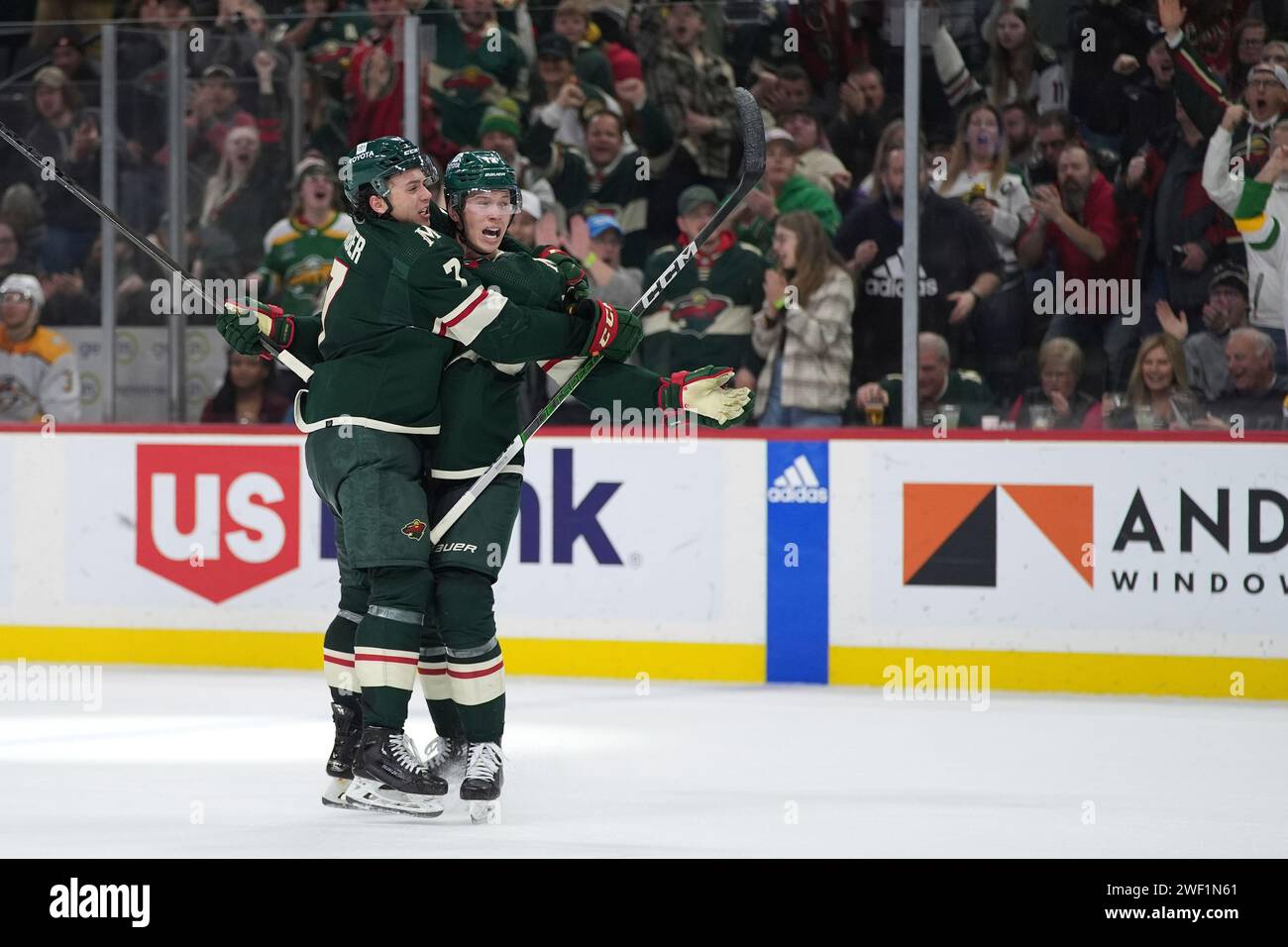 Minnesota Wild left wing Matt Boldy, right, celebrates with defenseman ...