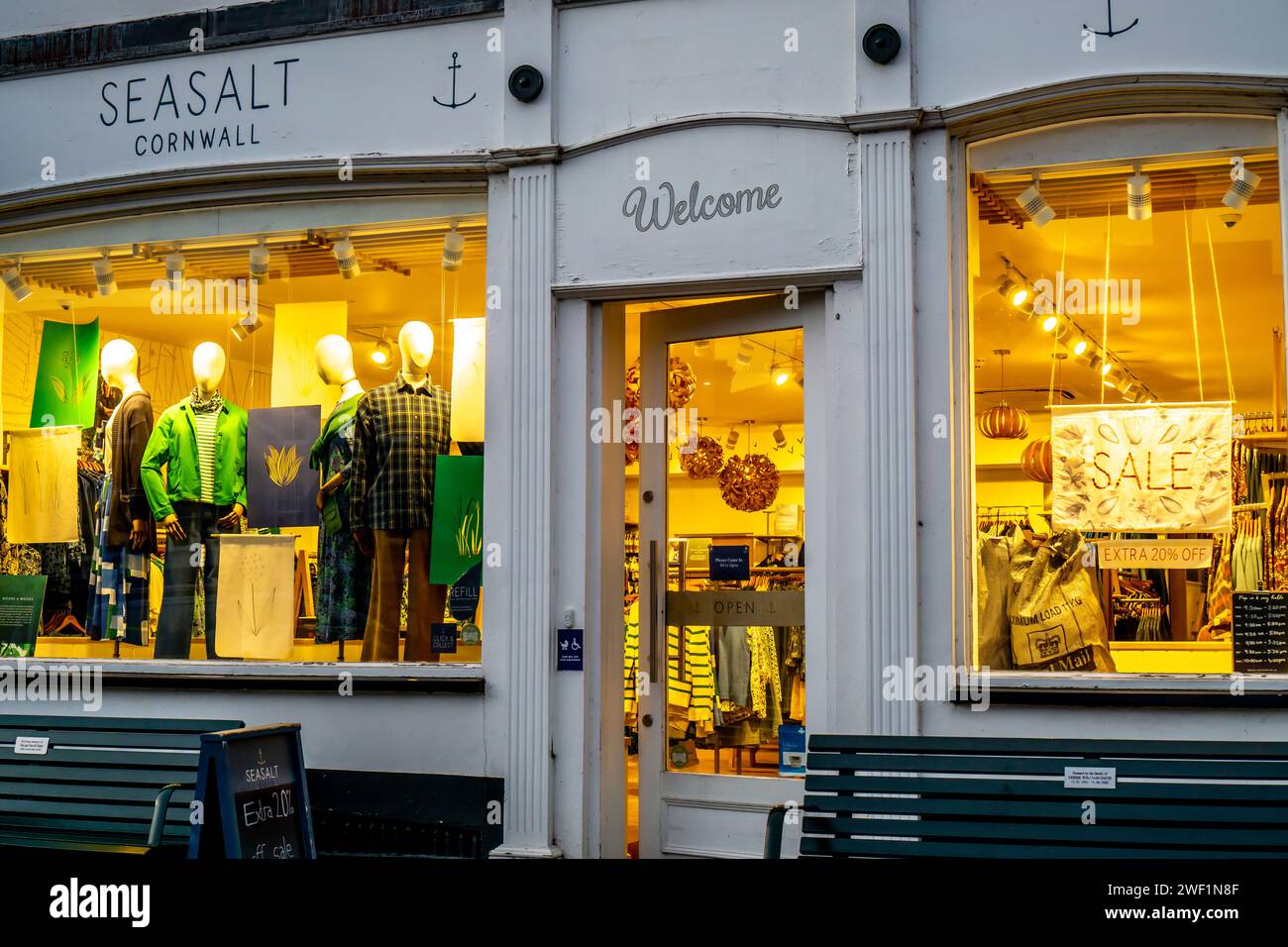 Lit up shop front of a Seasalt clothing store Stock Photo - Alamy