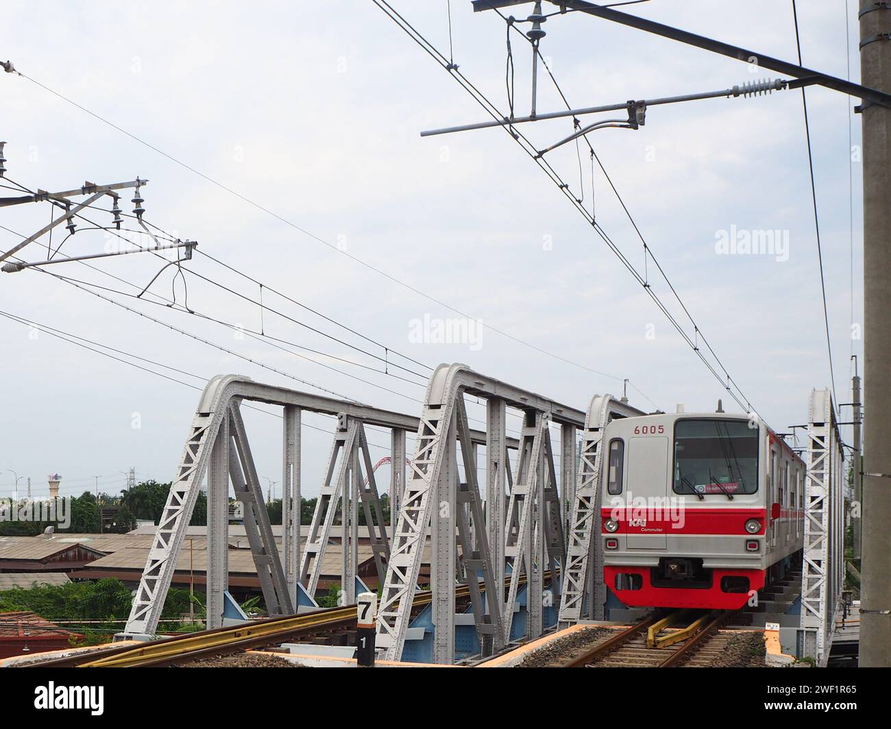 Commuter line, electric train PT. KAI in Kampung Bandan Train Station ...