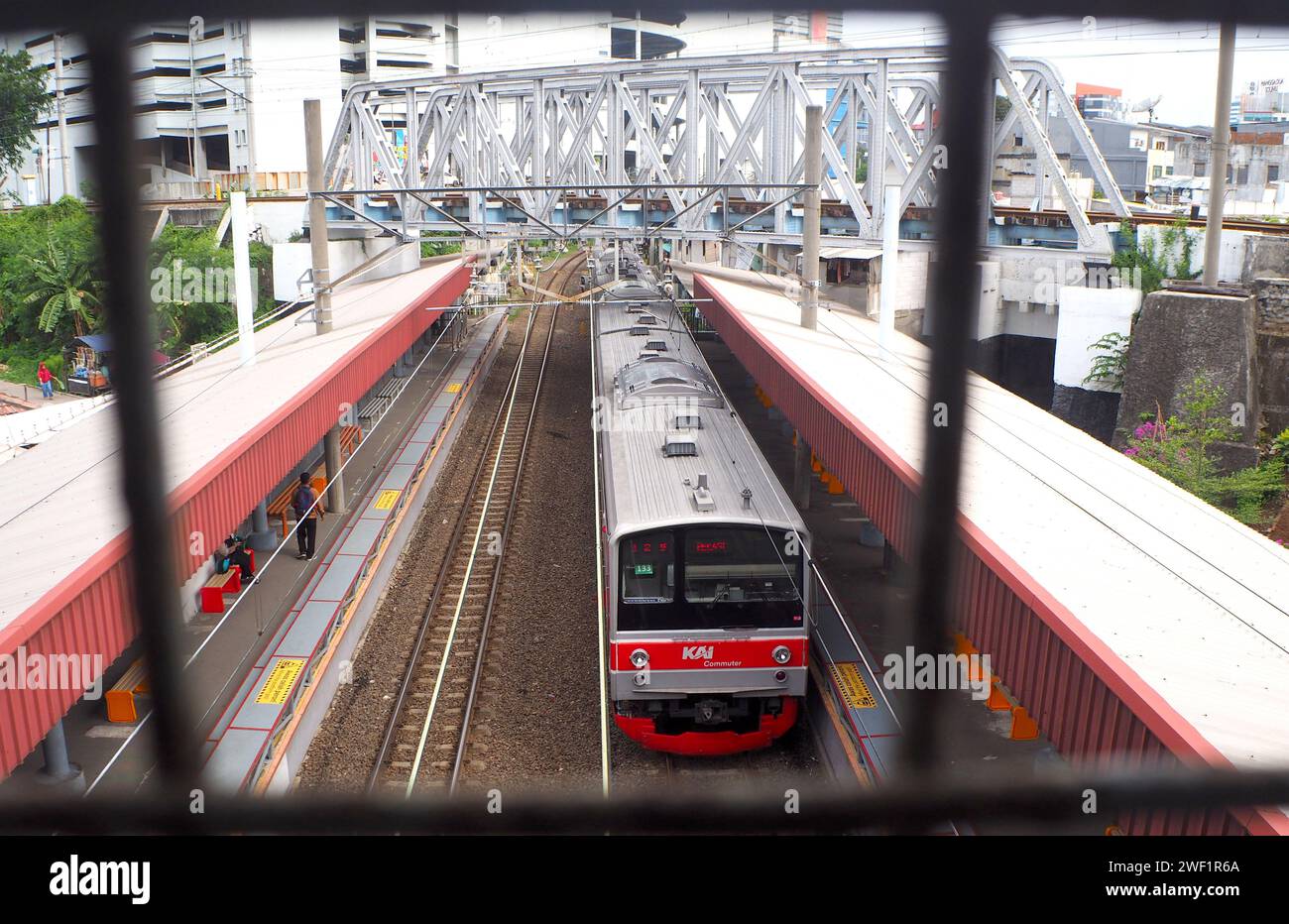 Commuter line, electric train PT. KAI in Kampung Bandan Train Station ...