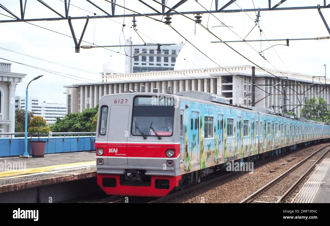 Commuter line, electric train PT. KAI in Juanda Train Station, with ...