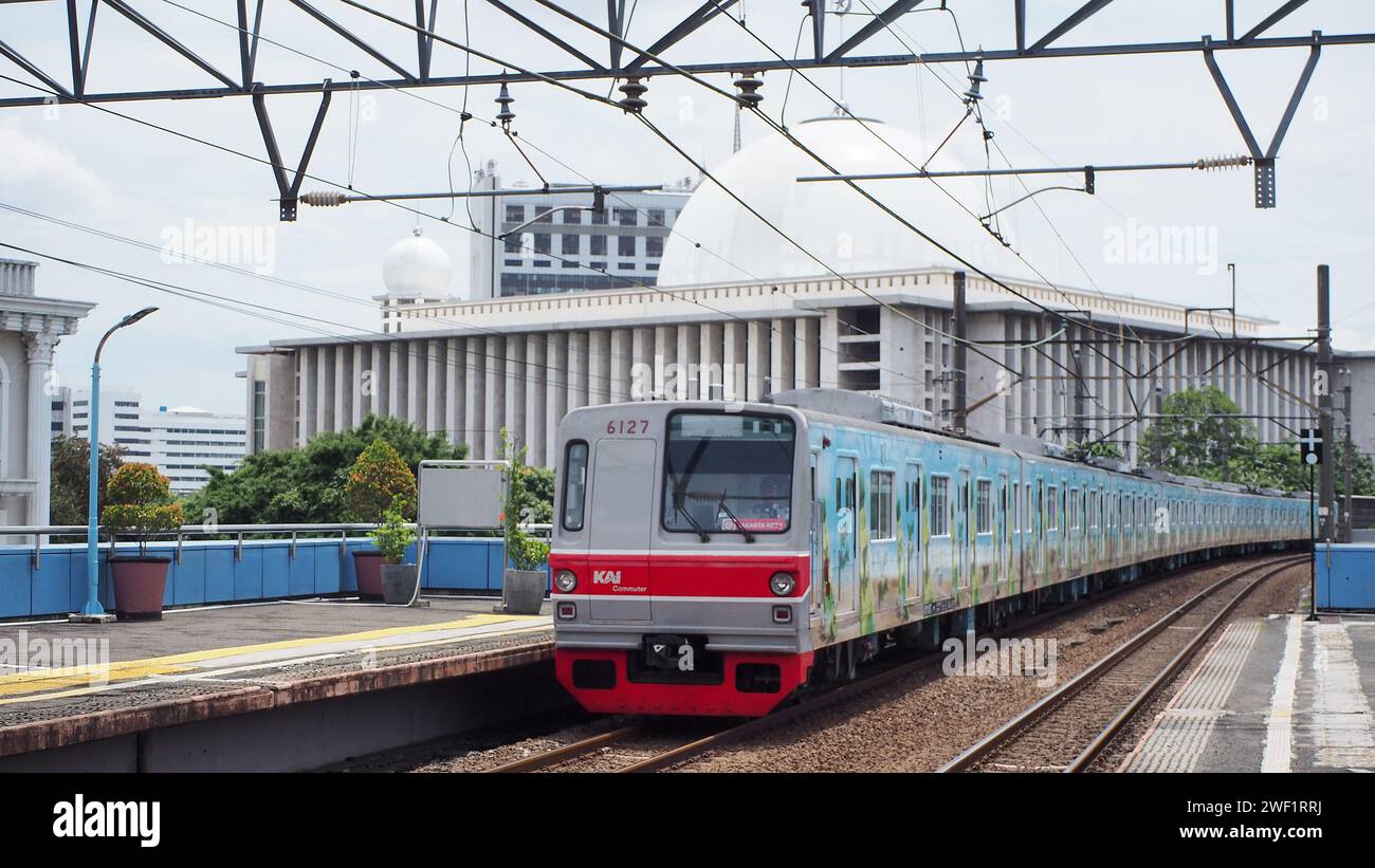 Commuter line, electric train PT. KAI in Juanda Train Station, with ...