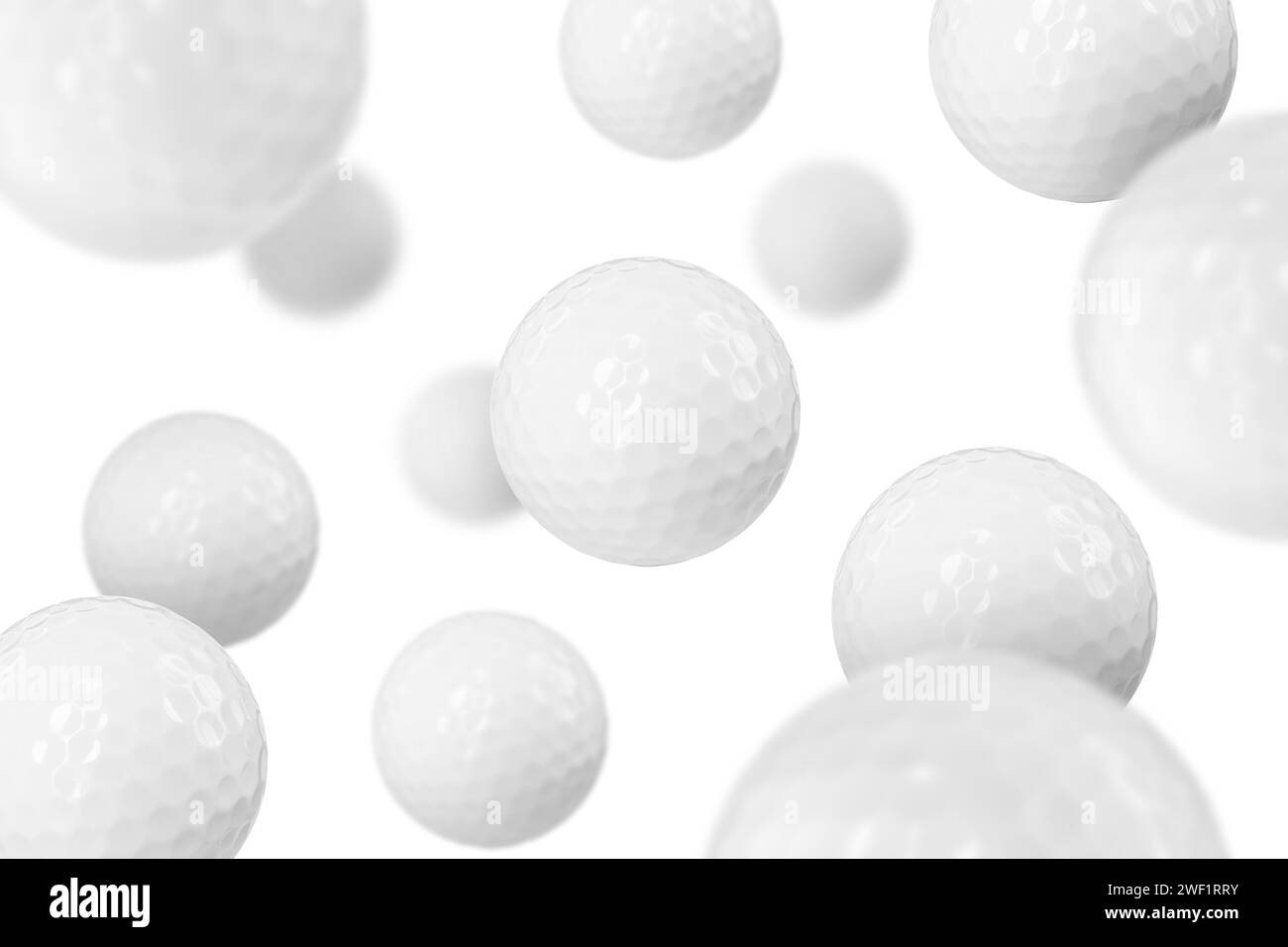 Many golf balls falling on white background Stock Photo - Alamy