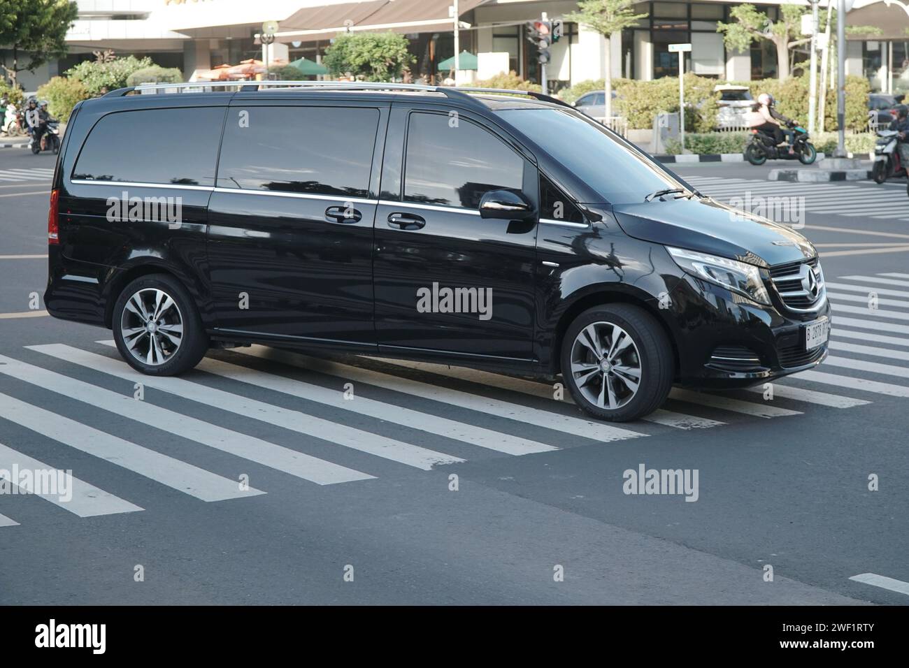 Mercedes-Benz V-class car,driving in commercial and business area, MH ...