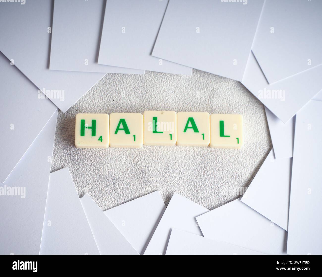 Scrabble letters spelling words HALAL. Halal is an Arabic word that ...