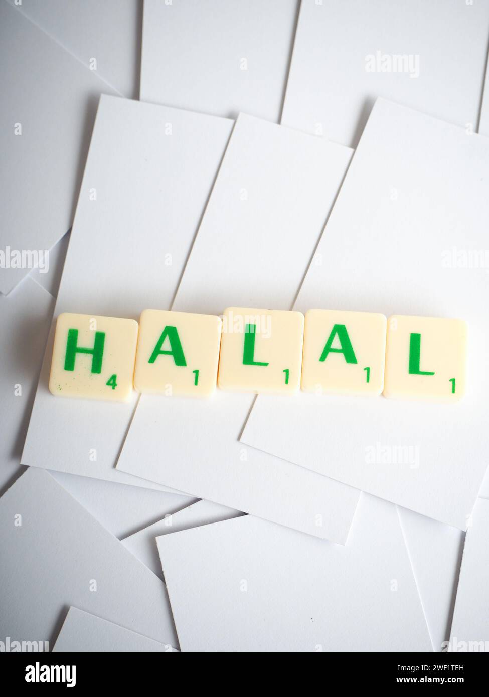 Scrabble letters spelling words HALAL. Halal is an Arabic word that ...
