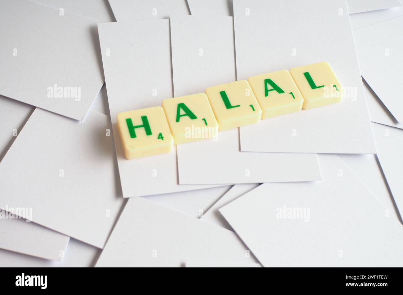 Scrabble letters spelling words HALAL. Halal is an Arabic word that ...