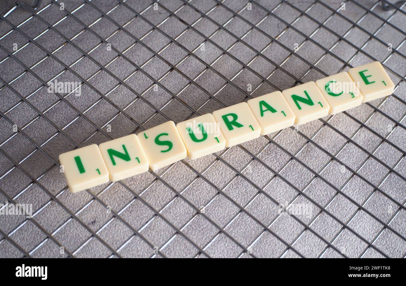 Scrabble letters spelling words INSURANCE Stock Photo - Alamy