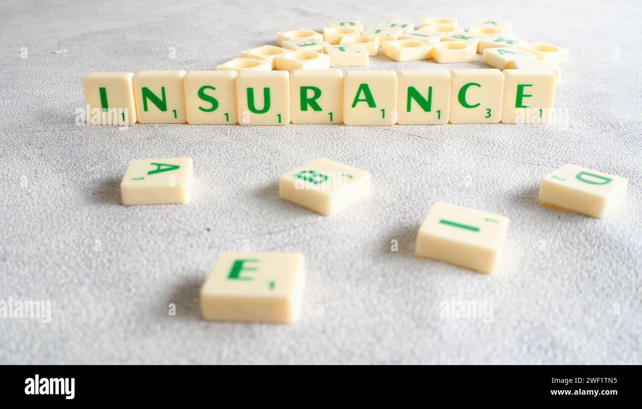 Scrabble letters spelling words INSURANCE Stock Photo - Alamy
