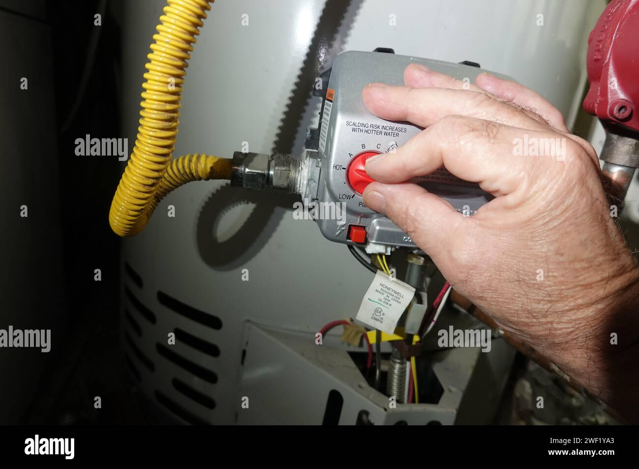 Adjusting the temperature of an American Hot water heater and storage ...