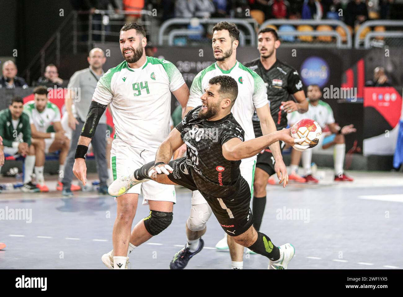 Cairo, Egypt. 27th Jan, 2024. Ahmed Abdel (front) of Egypt shoots ...