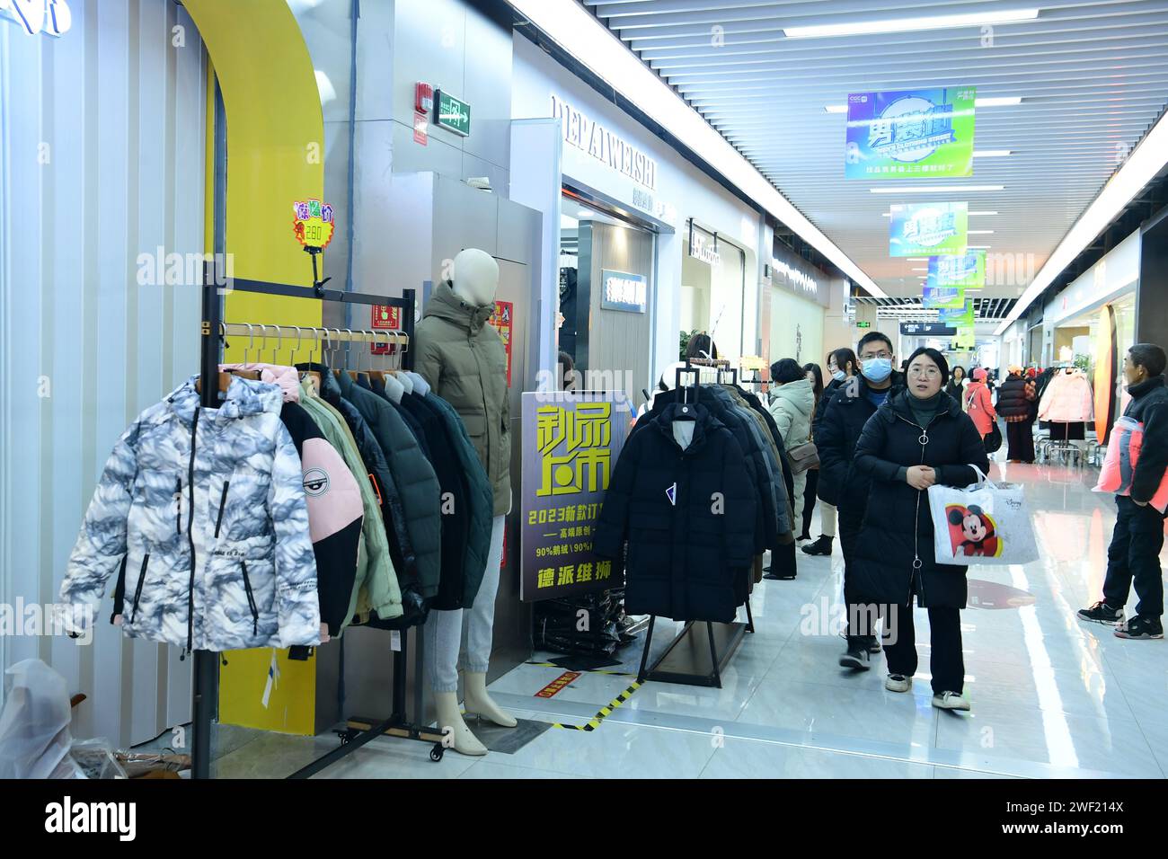 JIAXING, CHINA - JANUARY 27, 2024 - Customers buy down jackets at the ...