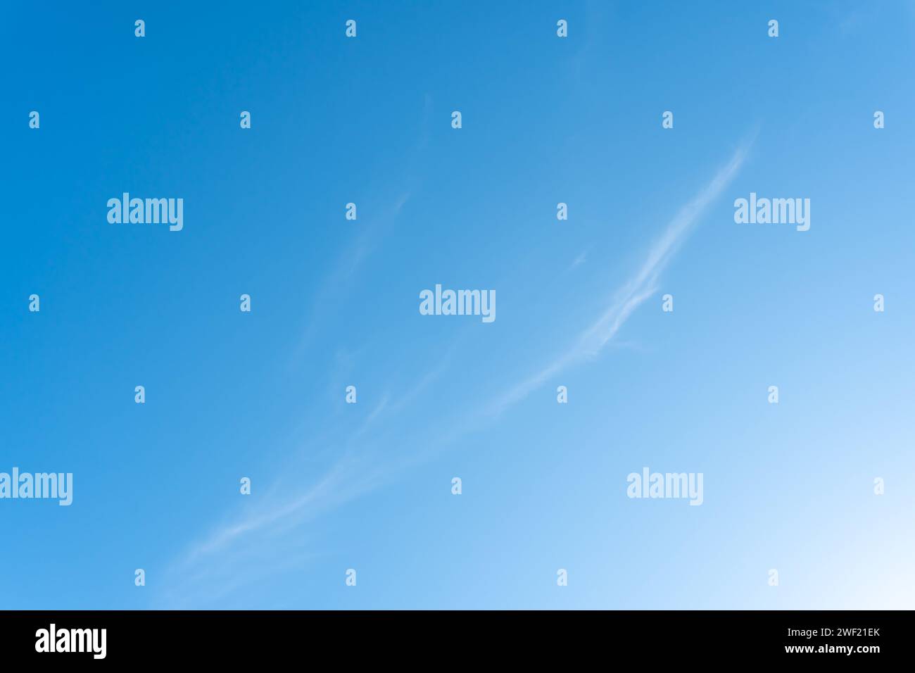 Beautiful blue sky with strange shape of clouds in the morning or ...