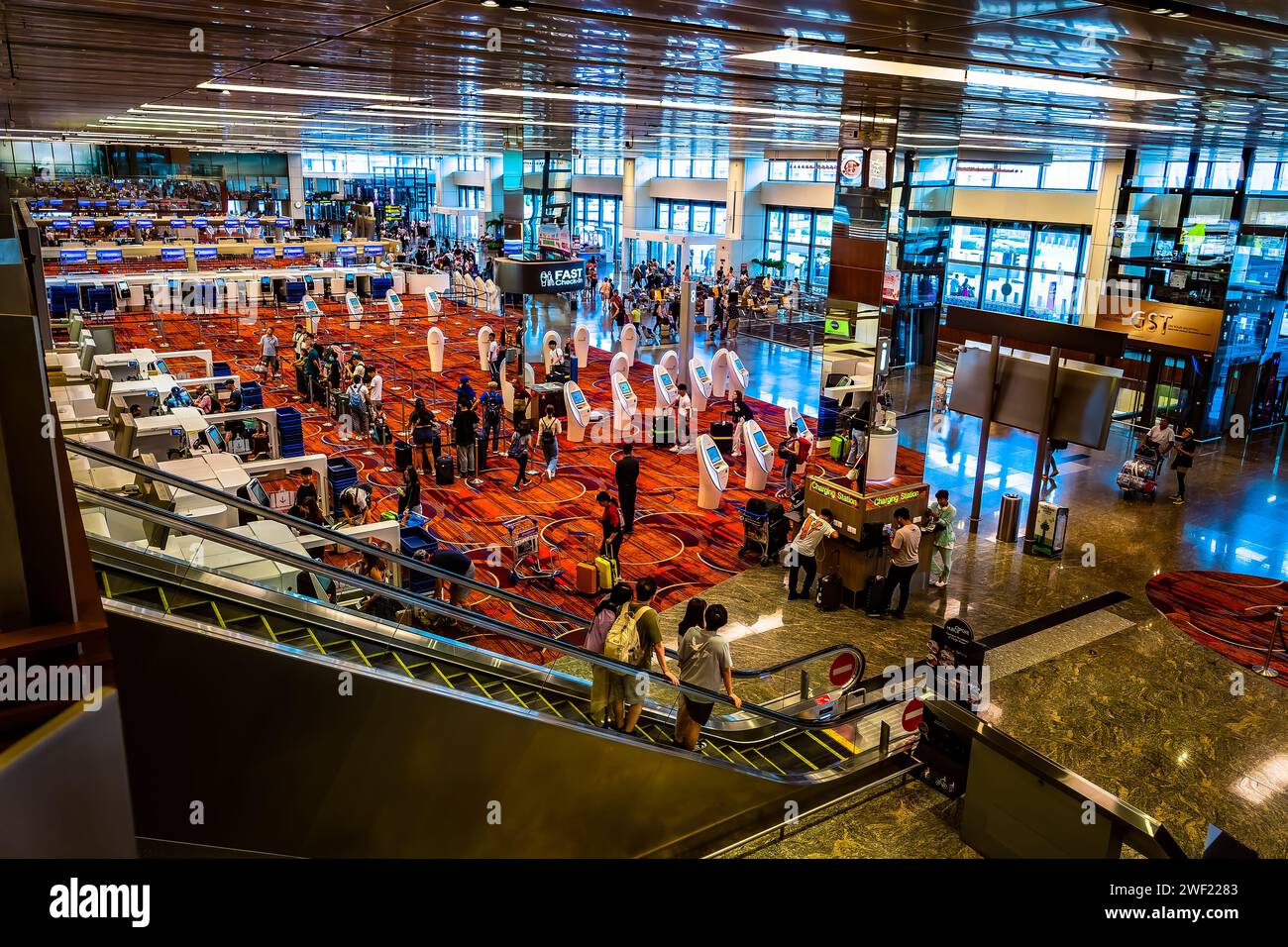 Departure hall check in area in Changi Airport Terminal 1, Singapore ...