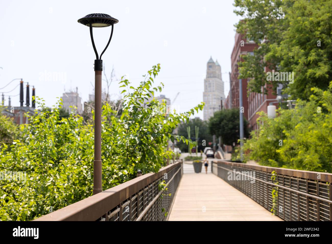 Afternoon view of the River Market Bridge and the downtown skyline of ...