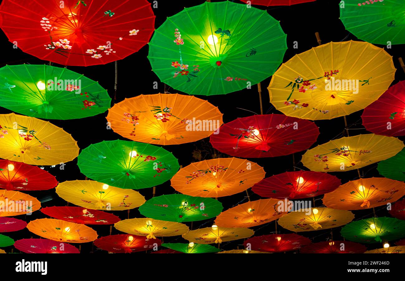 bright paper chinese umbrellas backdrop. vibrant, colorful background ...