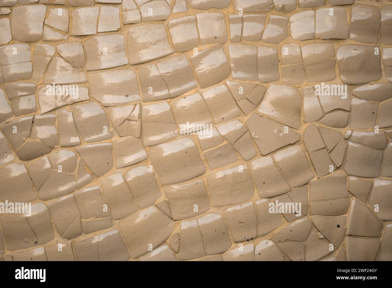 Beige and gray ceramic tile fragments forming mosaic background ...