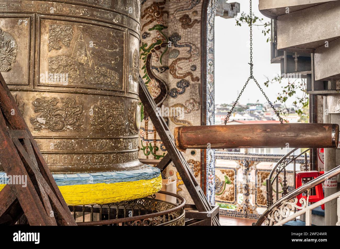 Inside an Asian sanctuary, monumental bronze bell, a symbol of ...