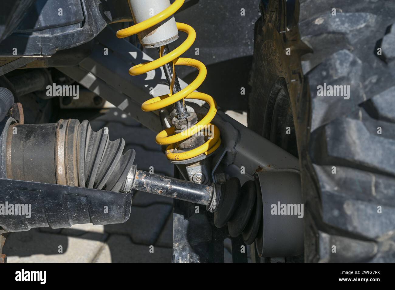 ATV rear suspension springs and shock absorbers 1 Stock Photo - Alamy