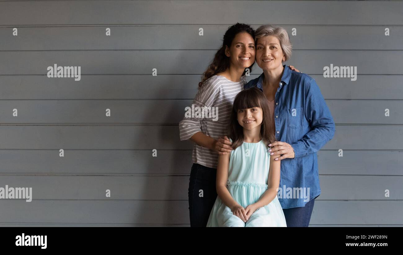 Photo portrait three females of diverse generations one hispanic family ...