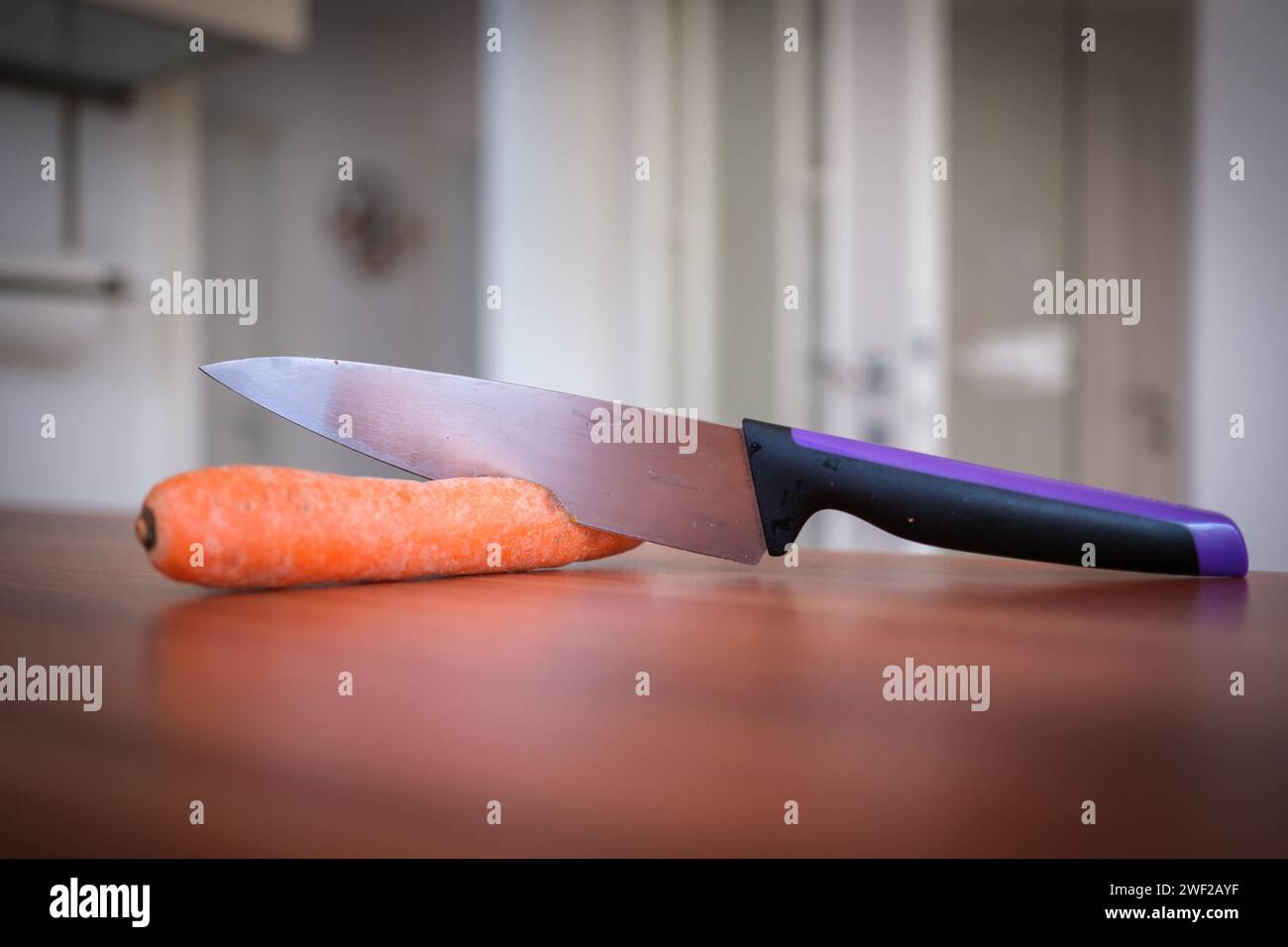 Woman cuts red pepper home hi-res stock photography and images - Alamy