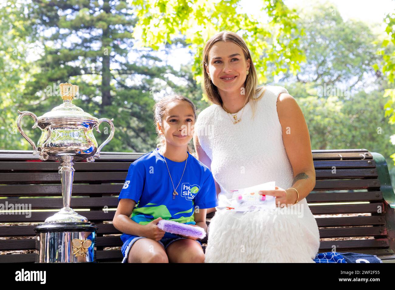 Melbourne, Australia. 28th Jan, 2024. Aryna Sabalenka of Belarus and a ball kid pose with the ...