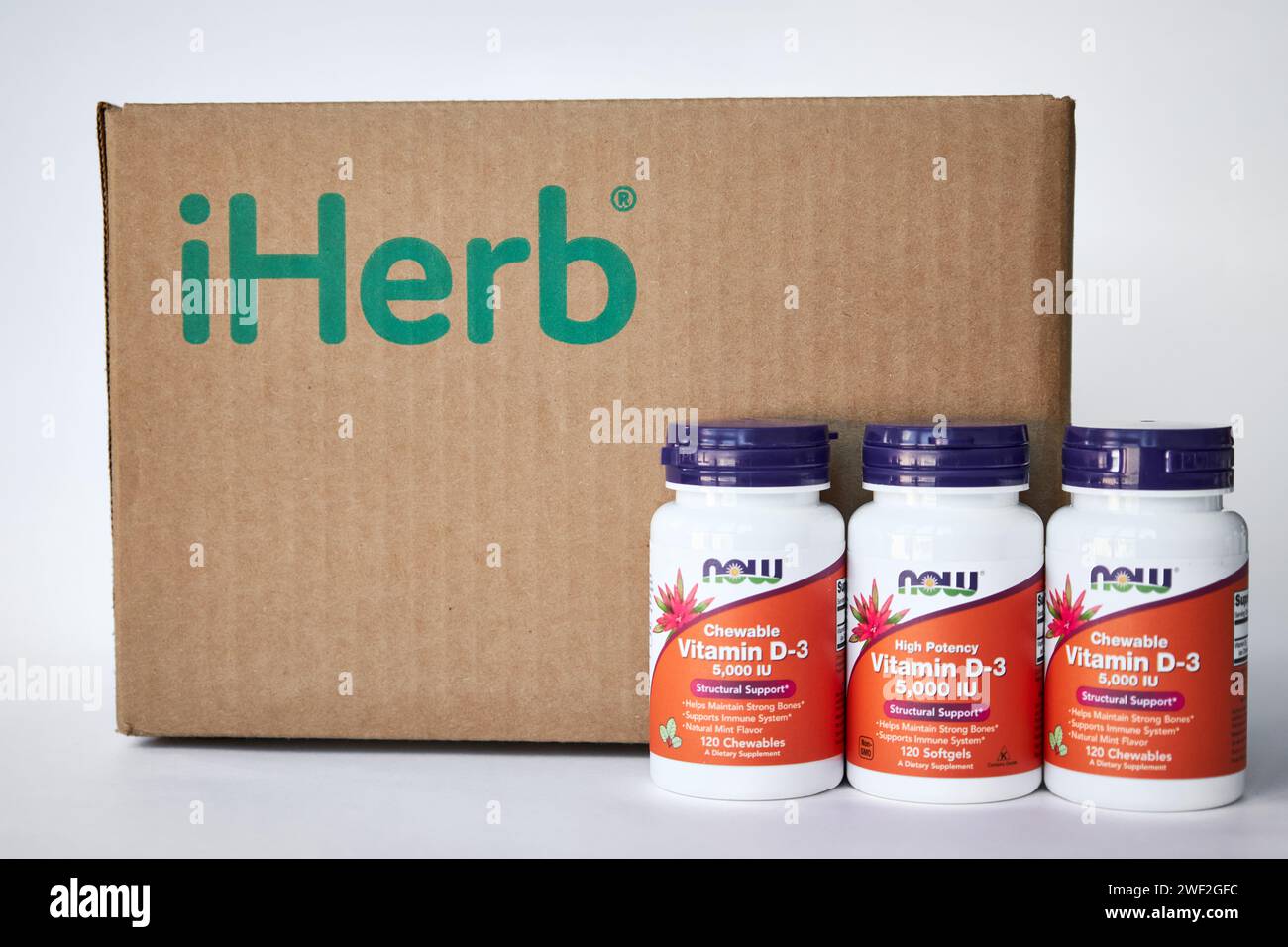 Three Jars of Chewable, High Potency, vitamin D-3, NOW Foods Company, near iHerb Brown Cardboard ...