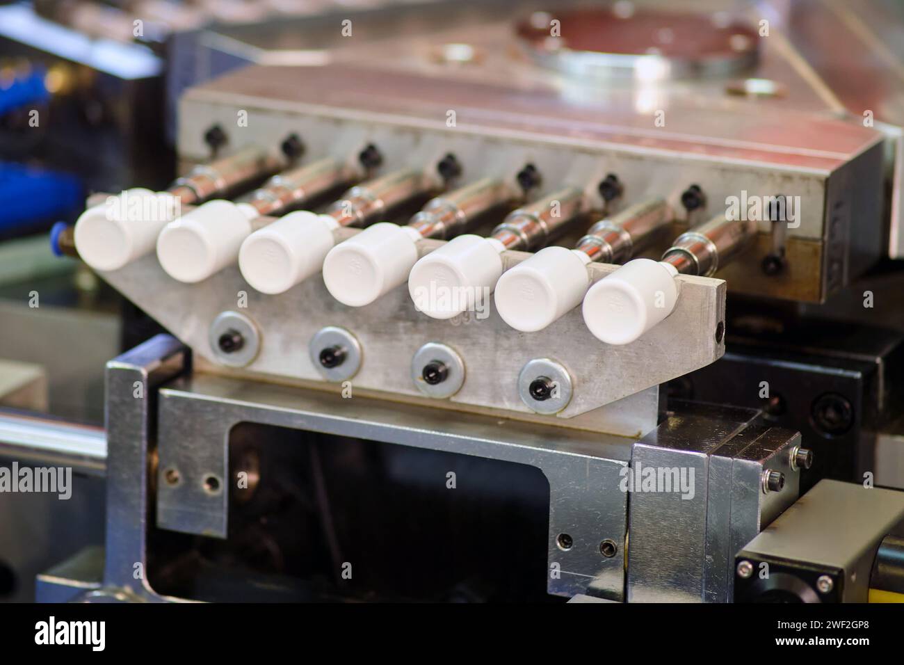 The process of manufacturing plastic products in automated production Stock Photo - Alamy