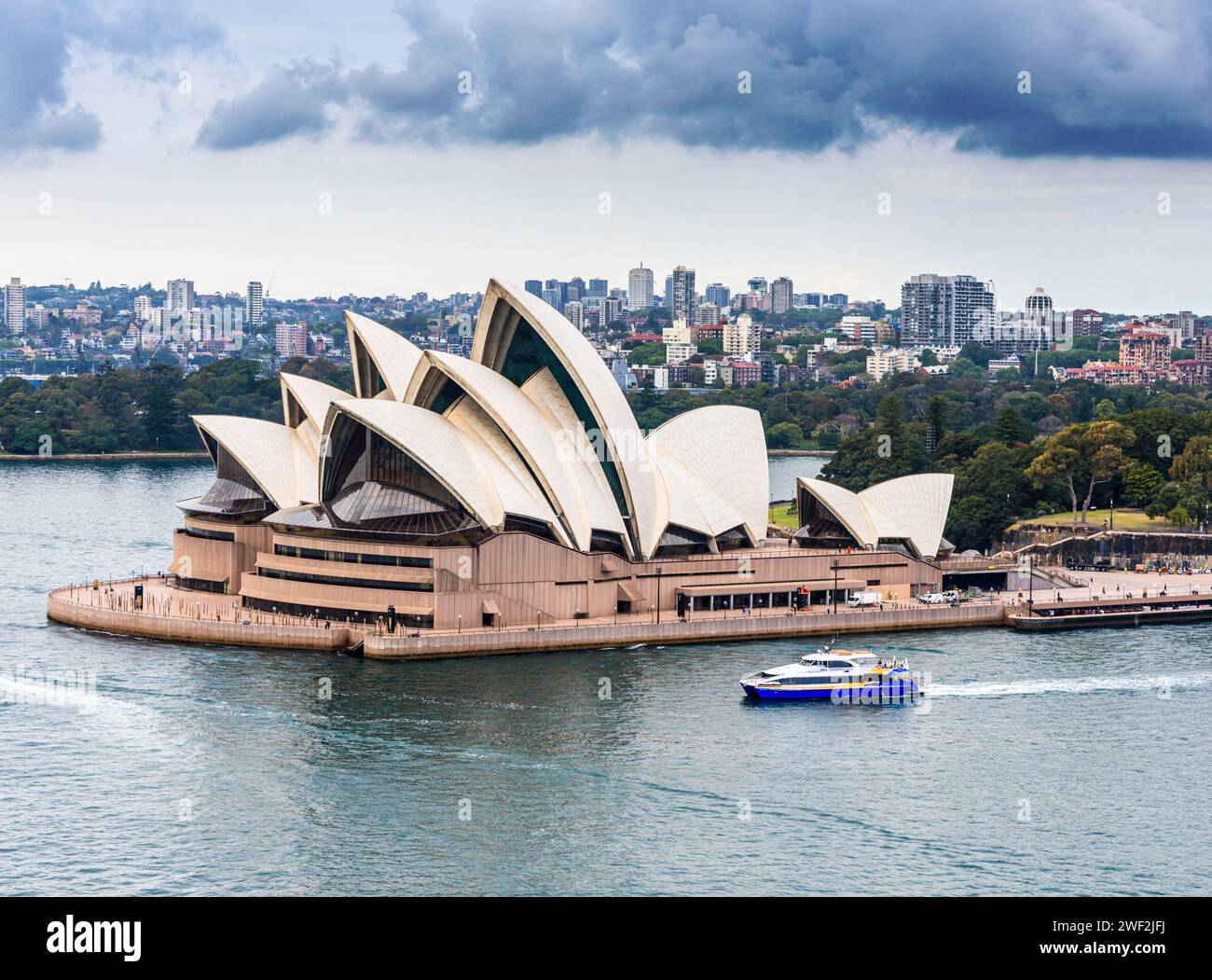 Dark clouds over The Sydney Opera House on Bennelong Point, Sydney, New ...