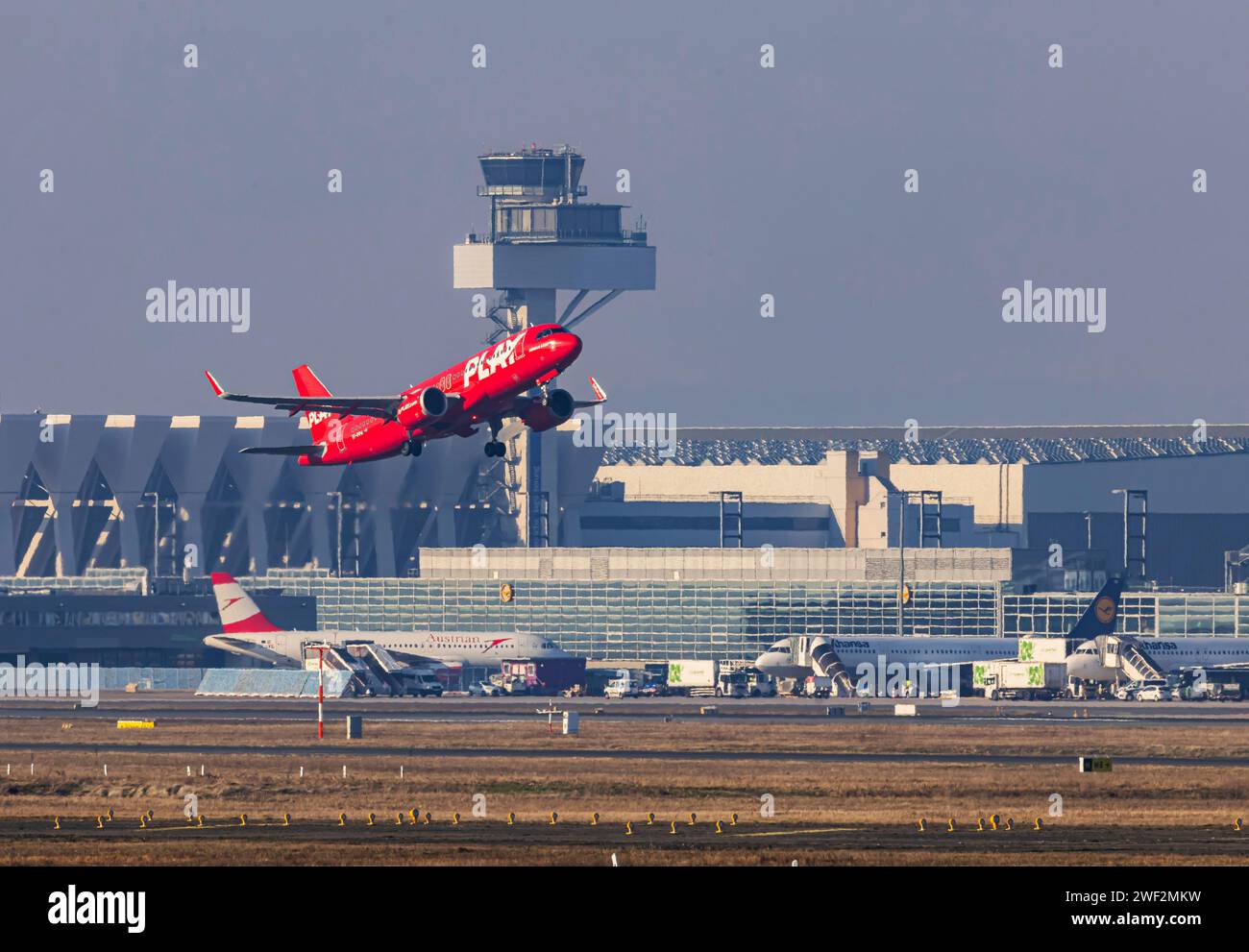 Aircraft taking off at Frankfurt Airport, Fraport Airport with tower ...