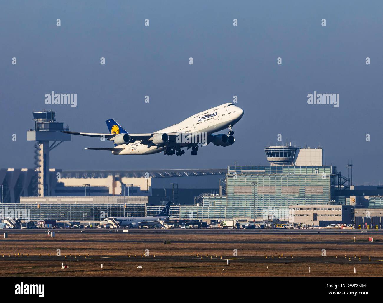 Aircraft taking off at Frankfurt Airport, Fraport Airport with tower. D-ABYH, LUFTHANSA, BOEING ...