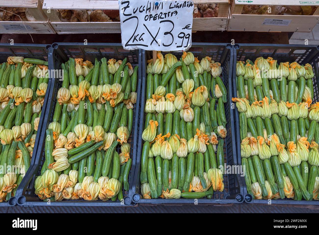 Fresh courgettes in boxes in front of a greengrocer's shop in the old ...