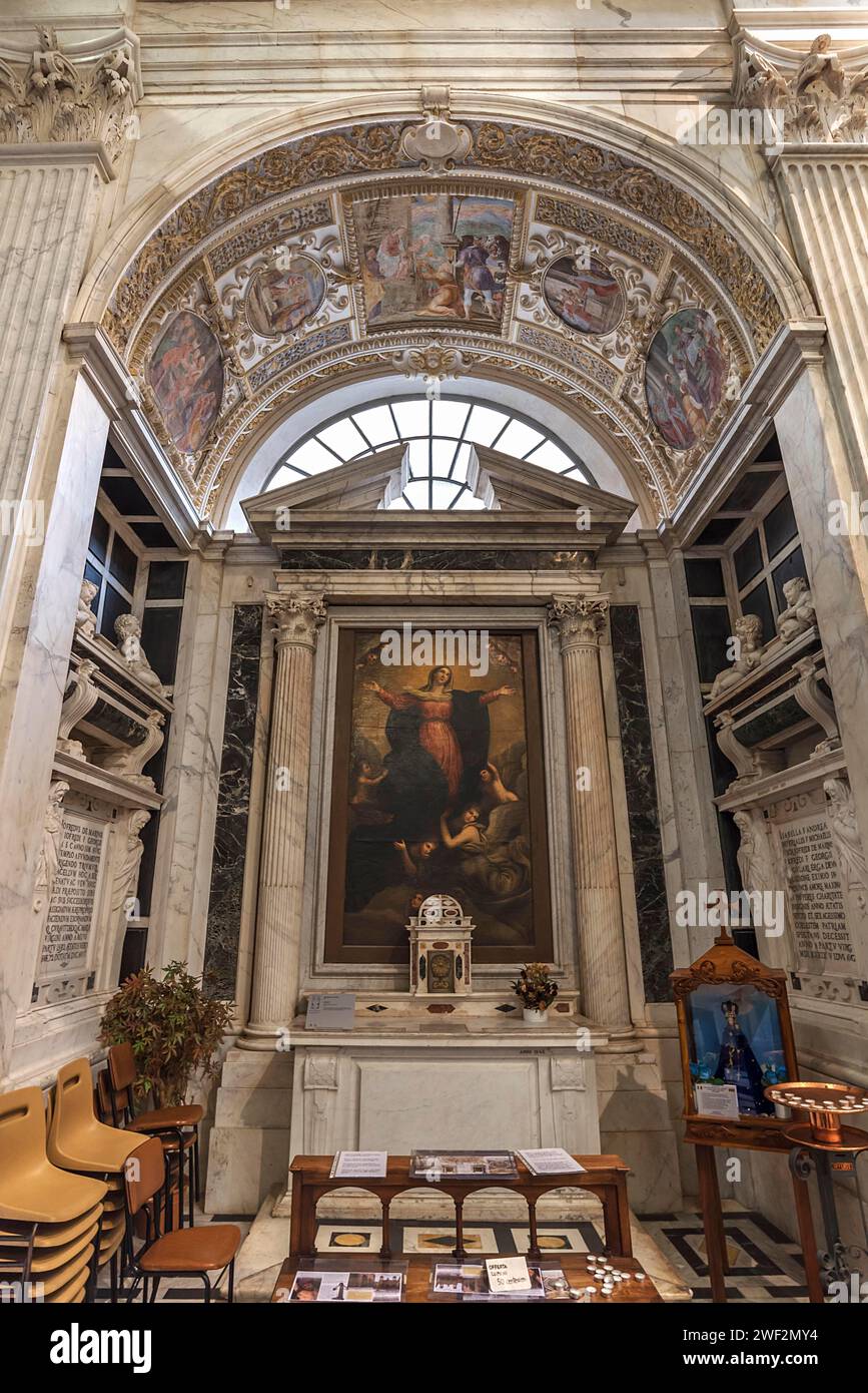 Veneration of the Virgin Mary in the side altar of the church of San ...