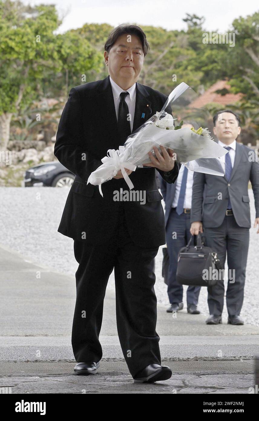 Japanese Chief Cabinet Secretary Yoshimasa Hayashi offers flowers at ...