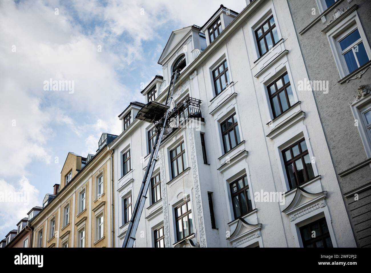 Munich, Germany. 25th Jan, 2024. A moving elevator stands at the window ...