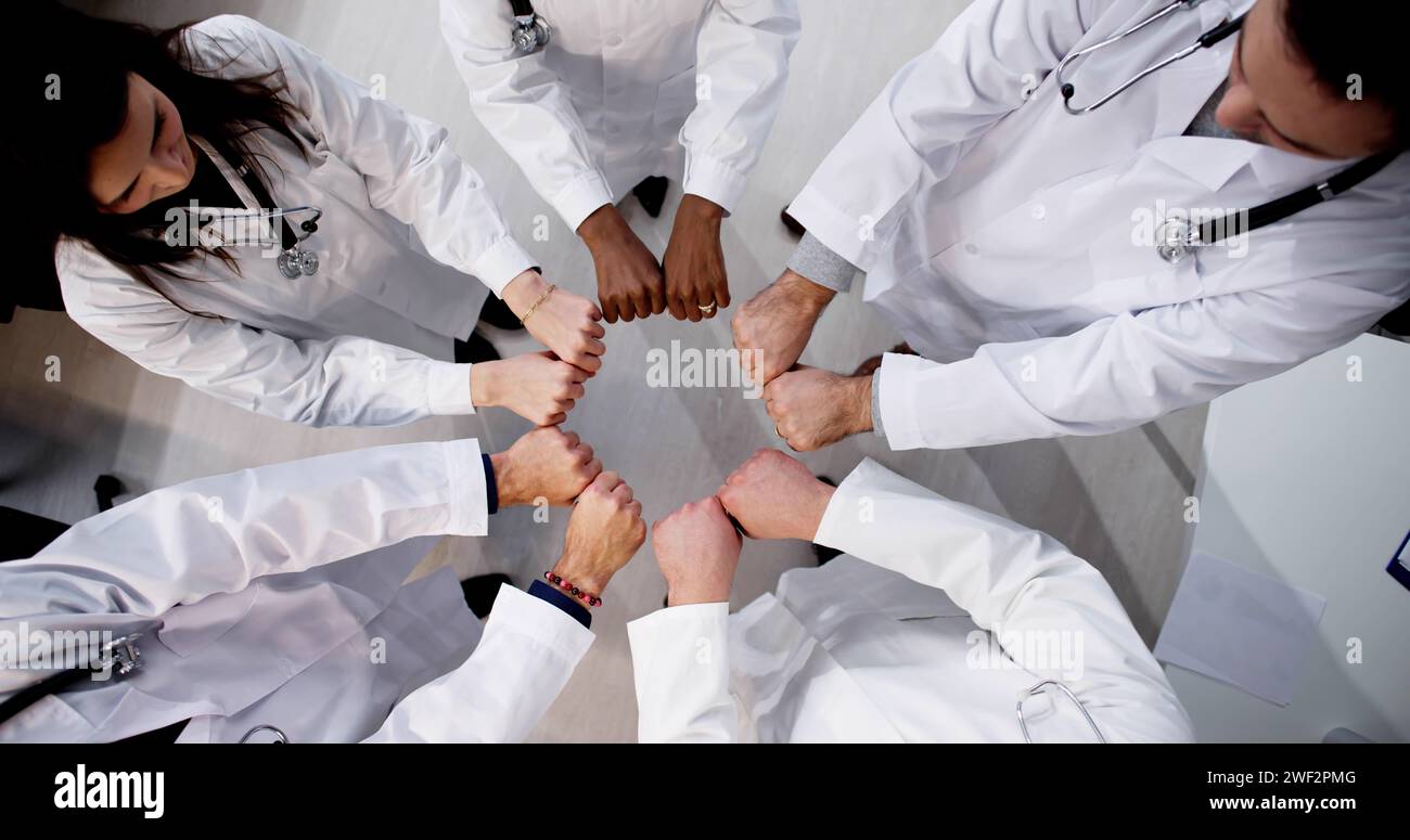 Diverse Medical Healthcare Staff Team Hands First Bump Stock Photo - Alamy