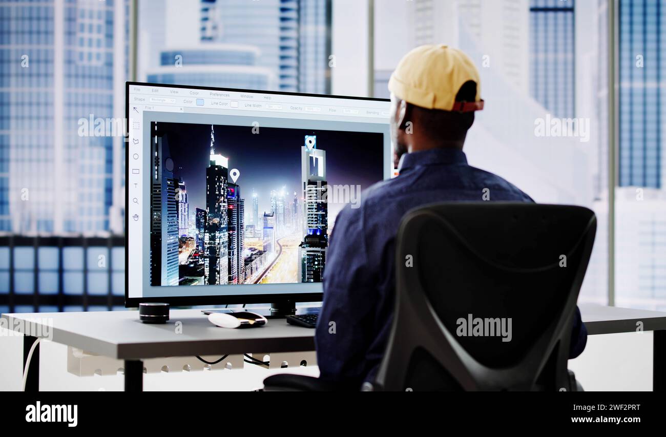 African Graphic Web Designer Using Design Editing Software Stock Photo ...