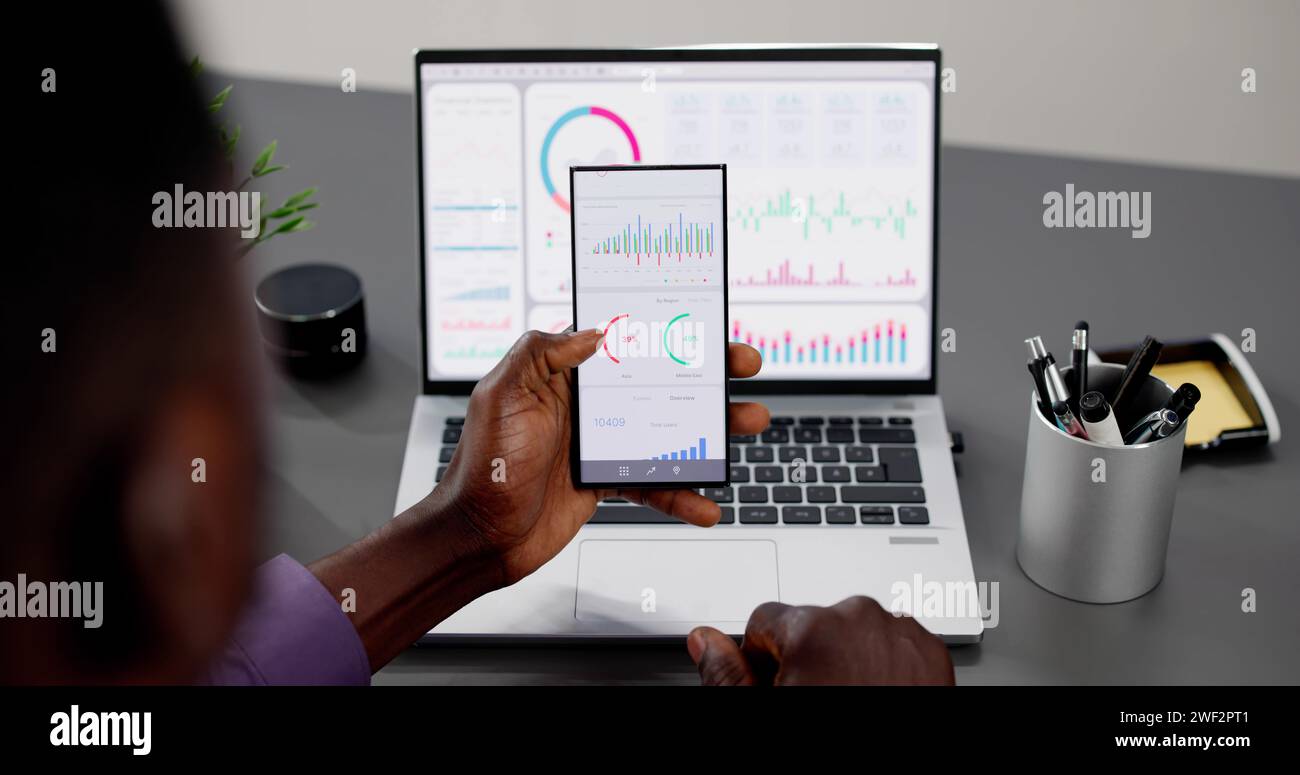 African American Data Analyst Using Data Analytics KPI Dashboard Stock ...