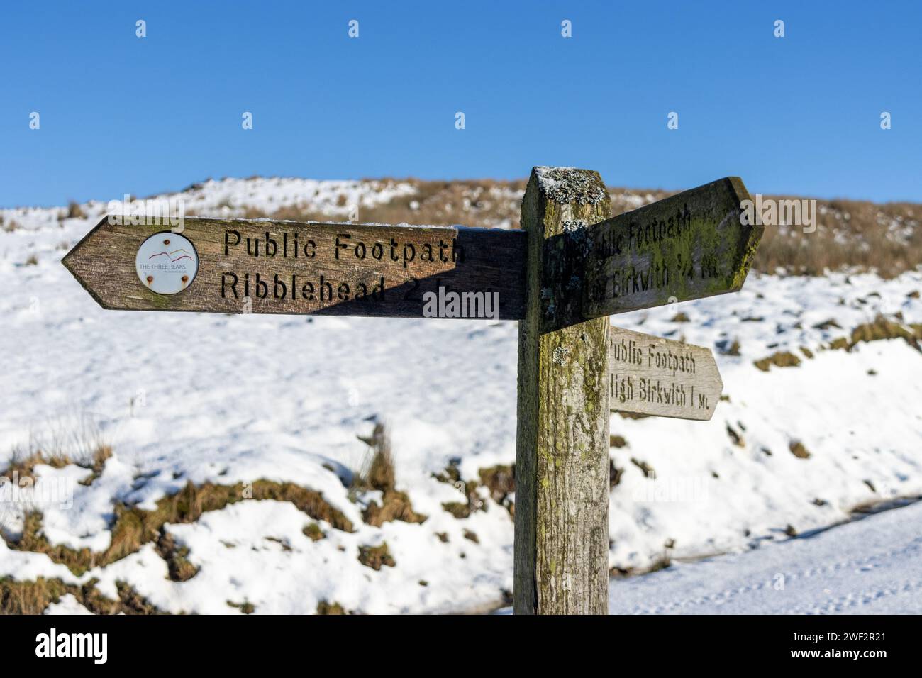 A wooden signpost in the Yorkshire Dales on the Three Peaks route in ...
