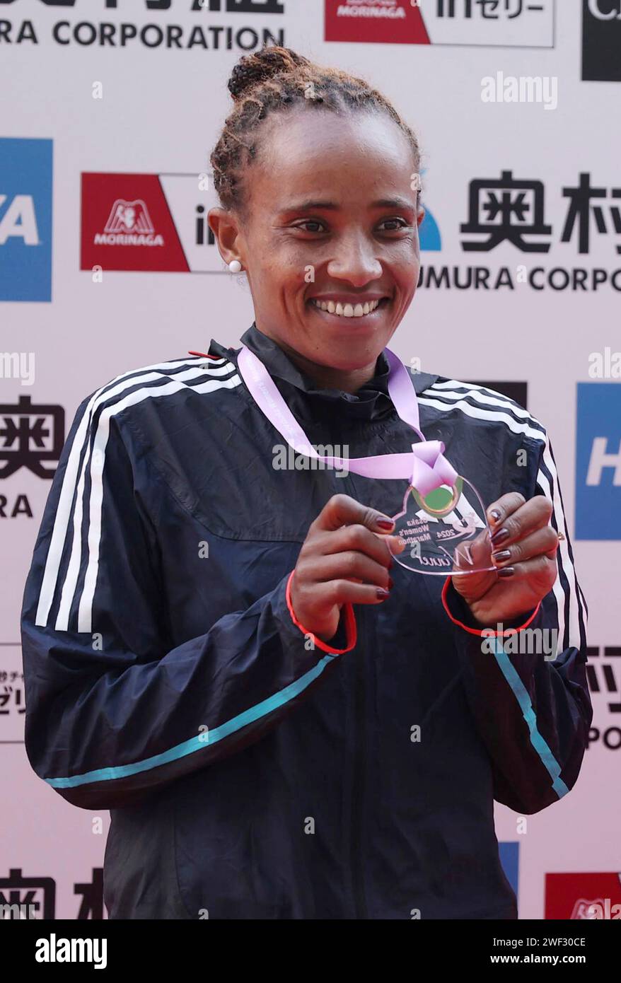 Warkenesh Edesa of Ethiopia shows her gold medal during 2024 Osaka ...