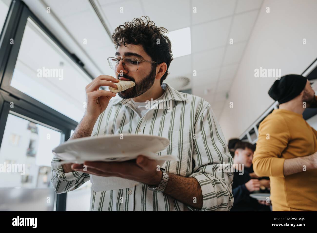 Successful business person enjoying a relaxing lunch break Stock Photo ...