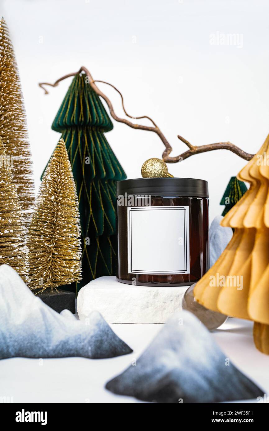 dark jar with lid on the background of Christmas decorations, side view ...