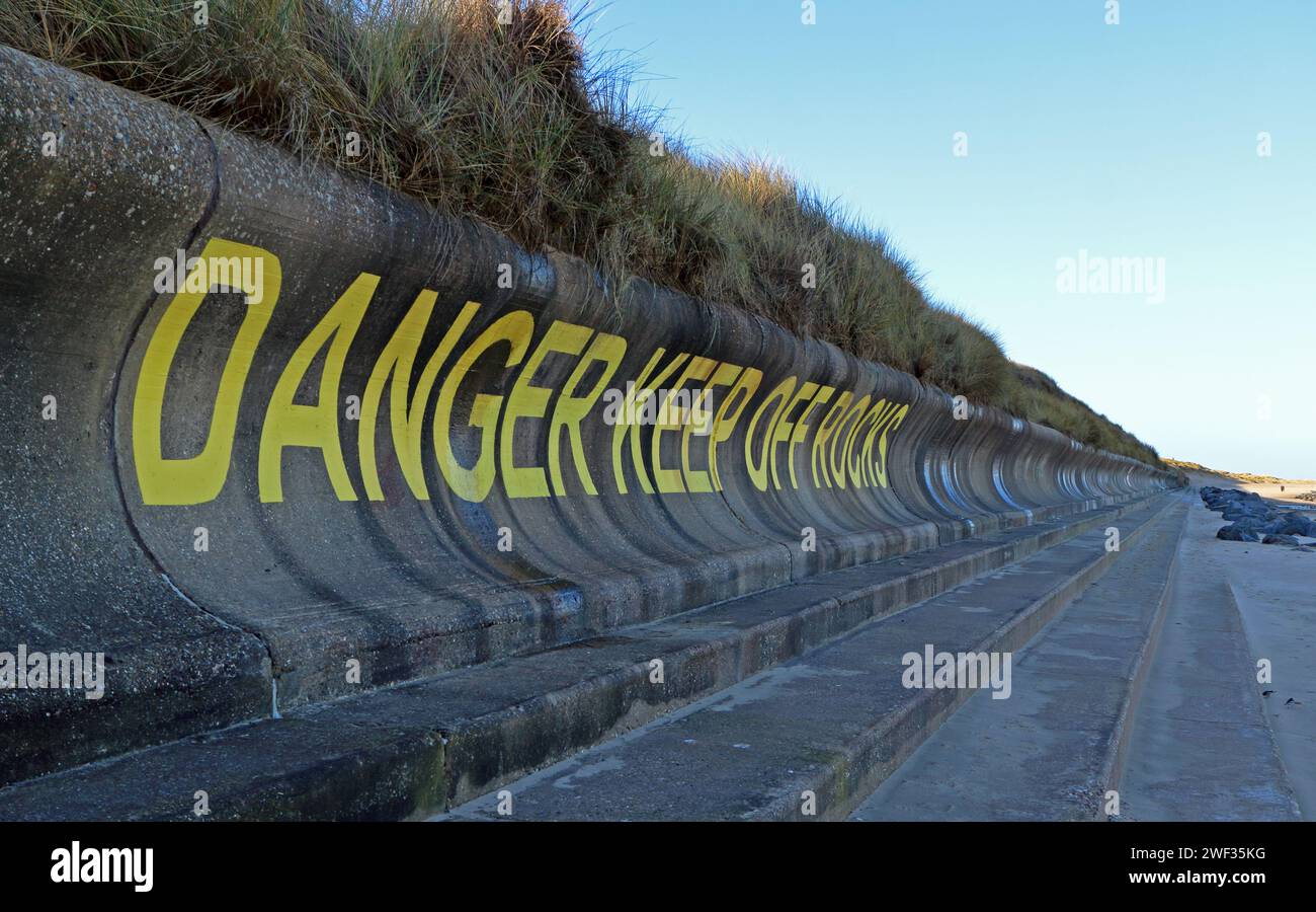 Danger sign on sea wall hi-res stock photography and images - Alamy