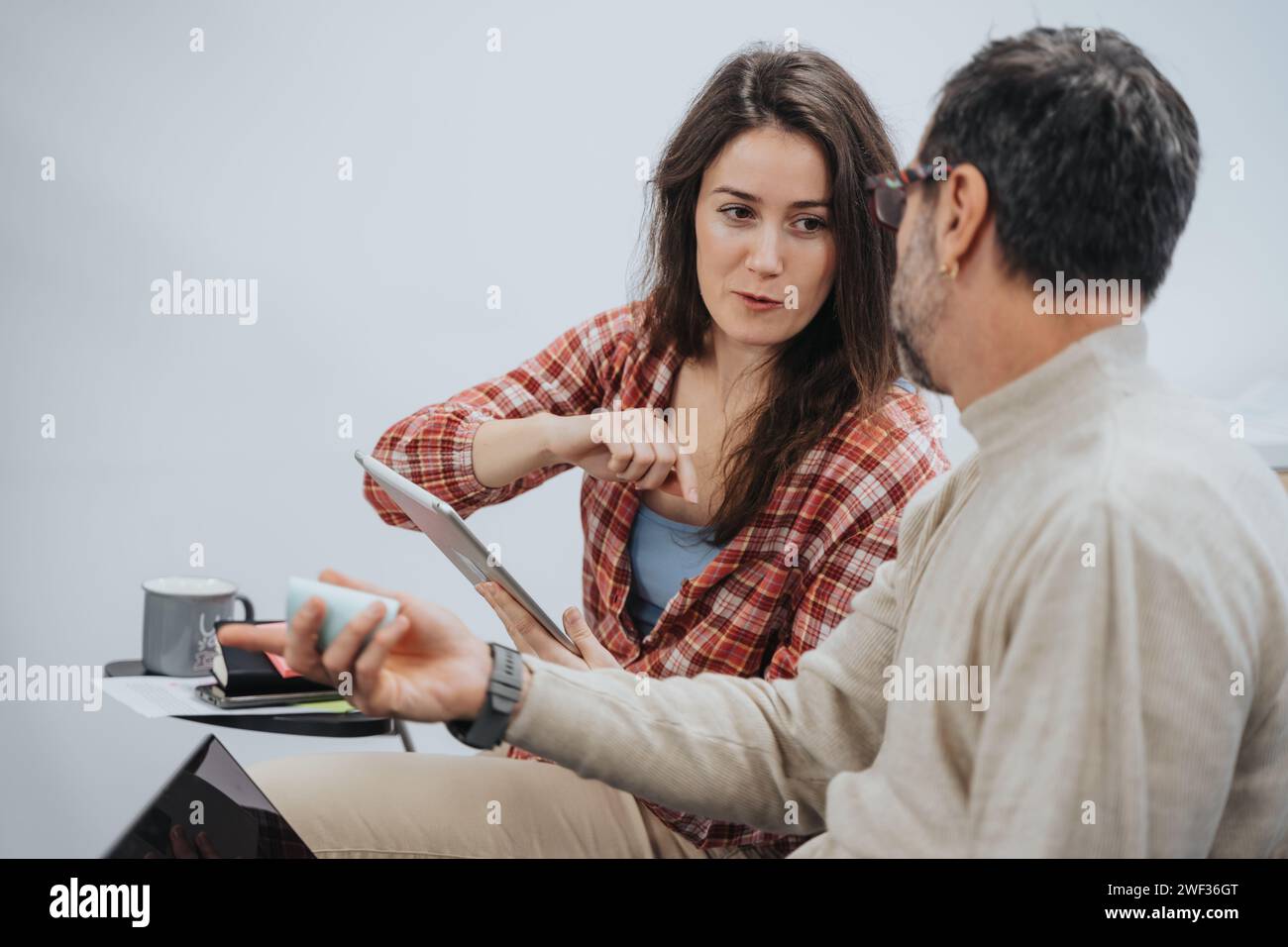 A cross generational, group of colleagues in a casual business ...