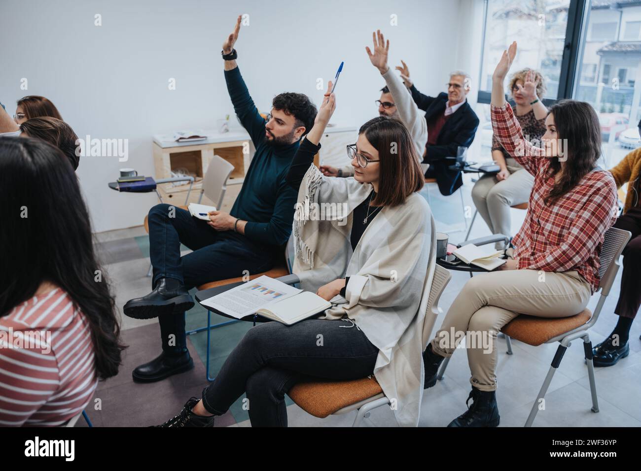 Students participating in presentation hi-res stock photography and ...