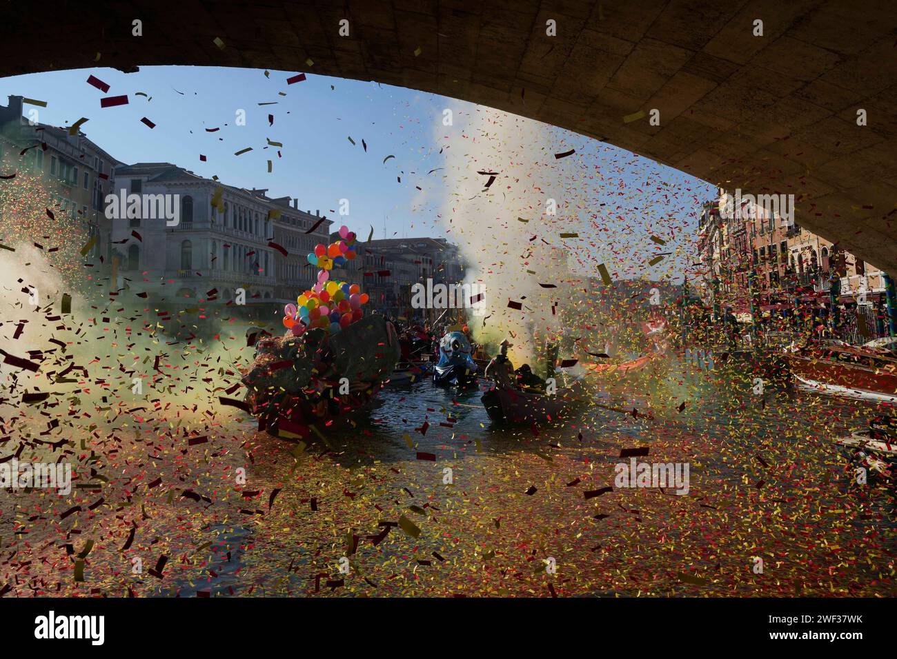 Boats sail as confetti exploded in the air during the traditional ...