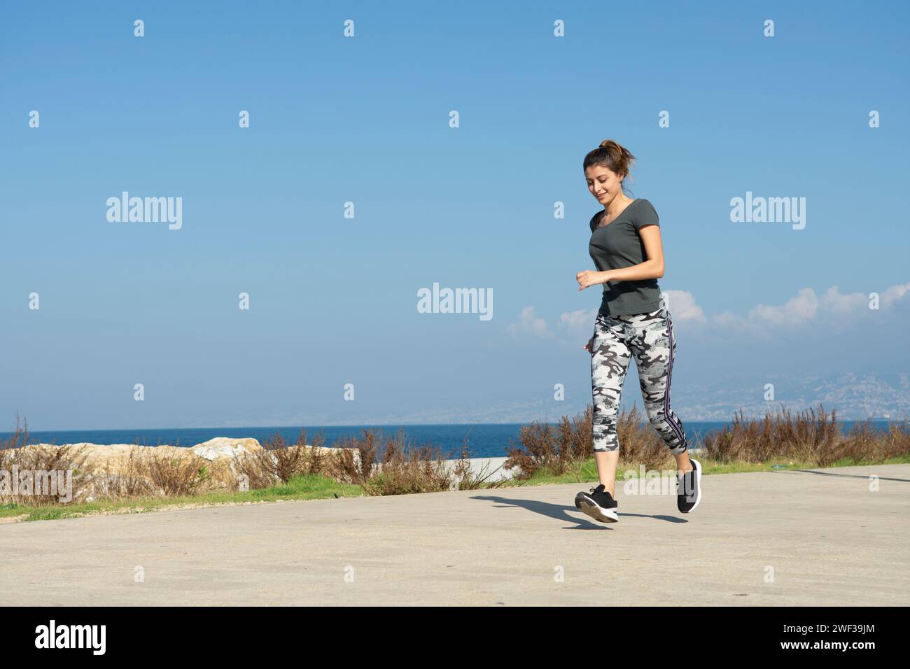 Adult woman cardio sport running hi-res stock photography and images ...