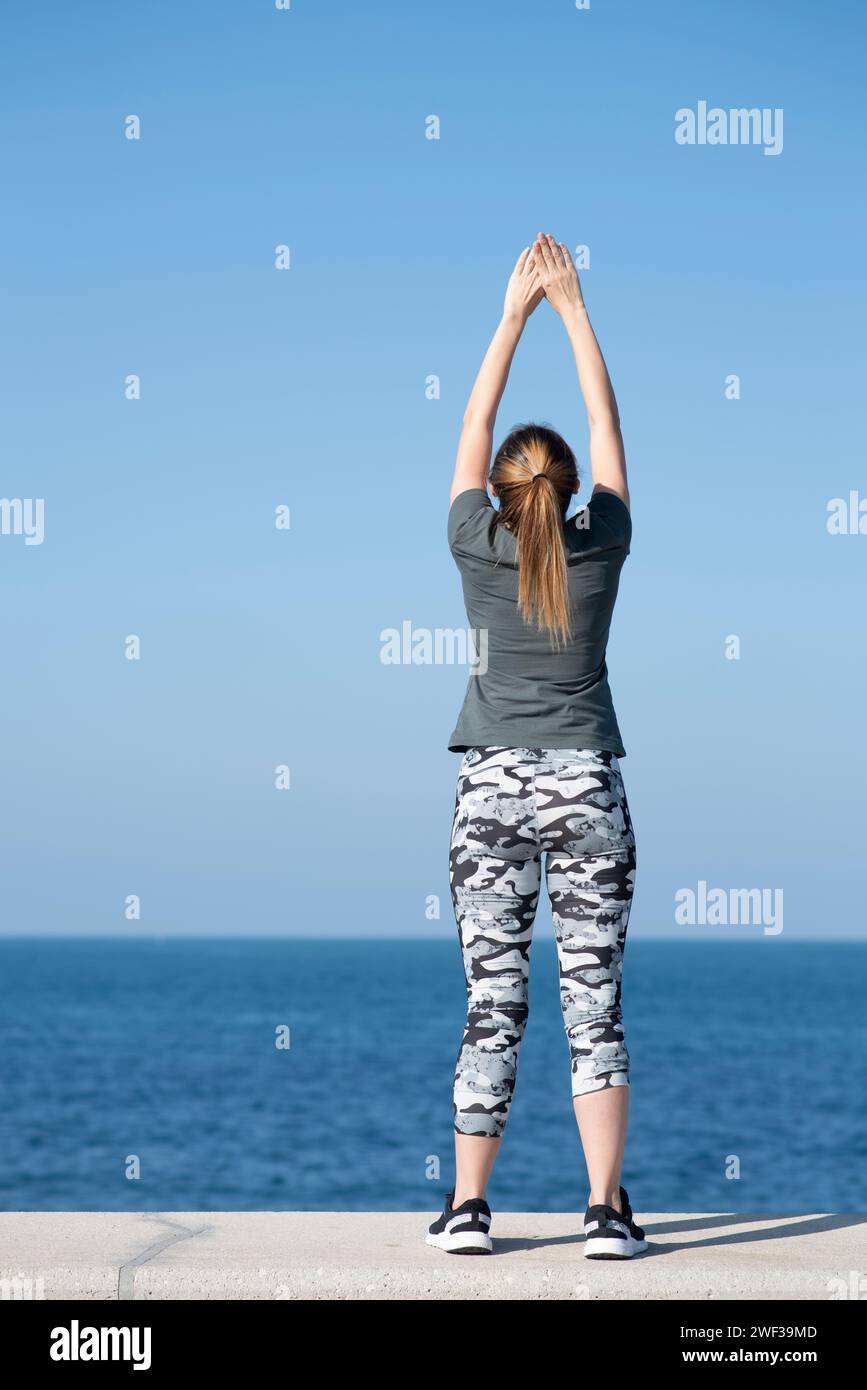 Woman excercising on back hi-res stock photography and images - Alamy