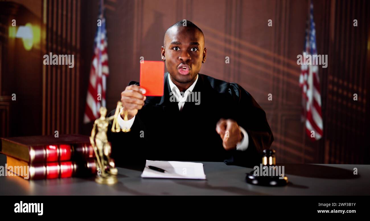 Judge In Courtroom Showing Red Card. Trial Rules And Law Stock Photo ...